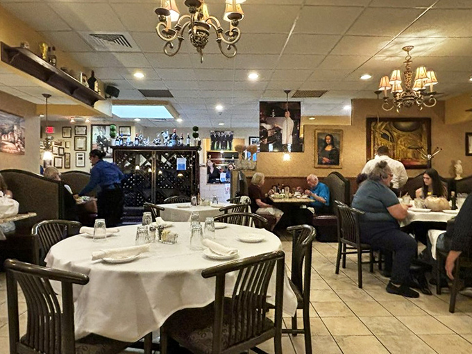 The dining room hums with conversation and clinking glasses, while warm lighting creates an atmosphere that encourages lingering over meals.