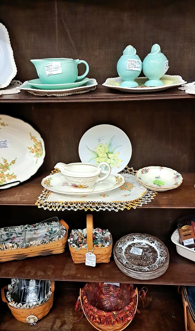 Delicate china patterns and vintage dishware await new dinner tables, their hand-painted details and gold accents speaking to craftsmanship rarely seen today.