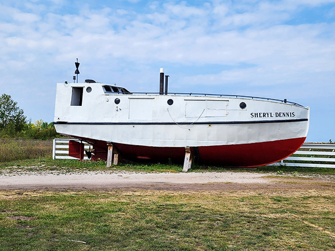 The "Sheryl Dennis" now catches only sunshine instead of fish &ndash; her white and red hull a colorful reminder of Lake Superior's working maritime history.