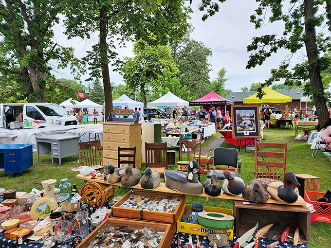 A treasure hunter's dream landscape &ndash; tables laden with potential finds stretch across the grounds under a perfect Minnesota sky.