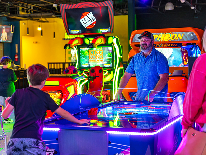 Between bouncing sessions, the arcade area offers digital thrills and friendly competition for those needing a gravity break.