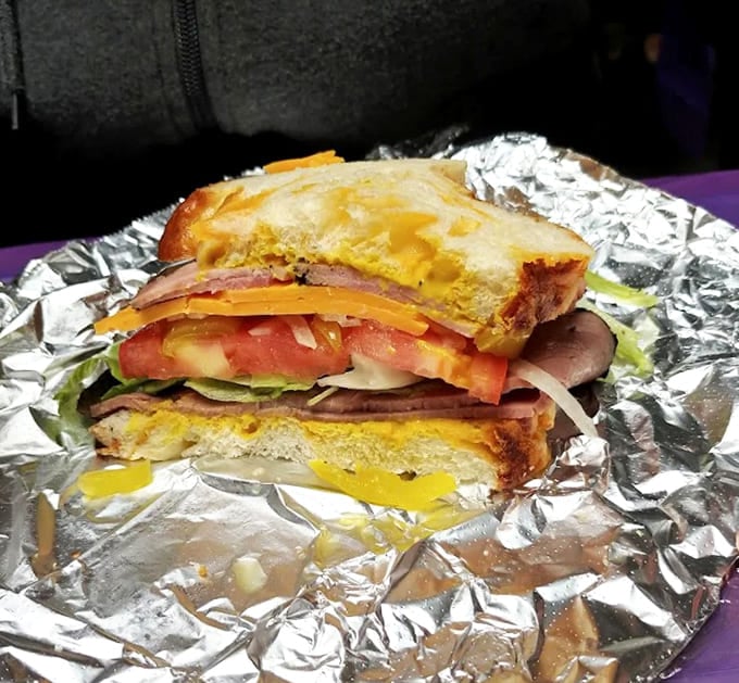 The cross-section reveals the sandwich's true character &ndash; perfectly proportioned layers that would make a geologist weep with admiration.