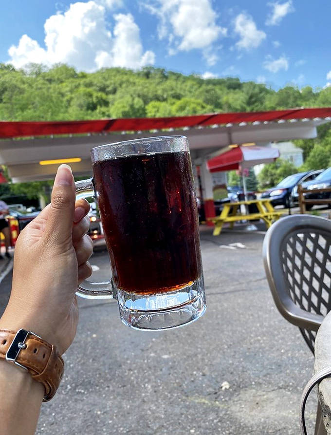 Homemade root beer in a frosty mug—liquid nostalgia crafted from a secret recipe that's outlasted eight presidents and countless food trends.