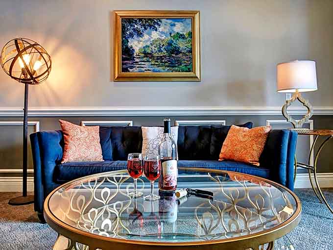 Sink into this elegant blue sofa with a glass of Riesling and watch sunset paint the sky through floor-to-ceiling windows.