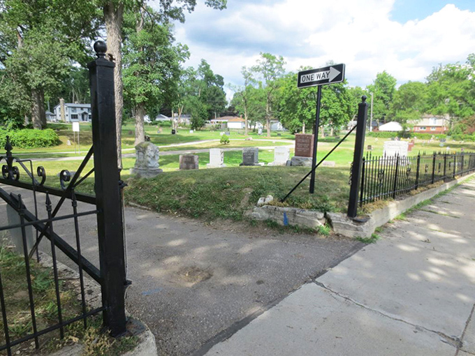 The open gate beckons curious visitors to explore both the historical significance and the unexplained phenomena within these grounds.