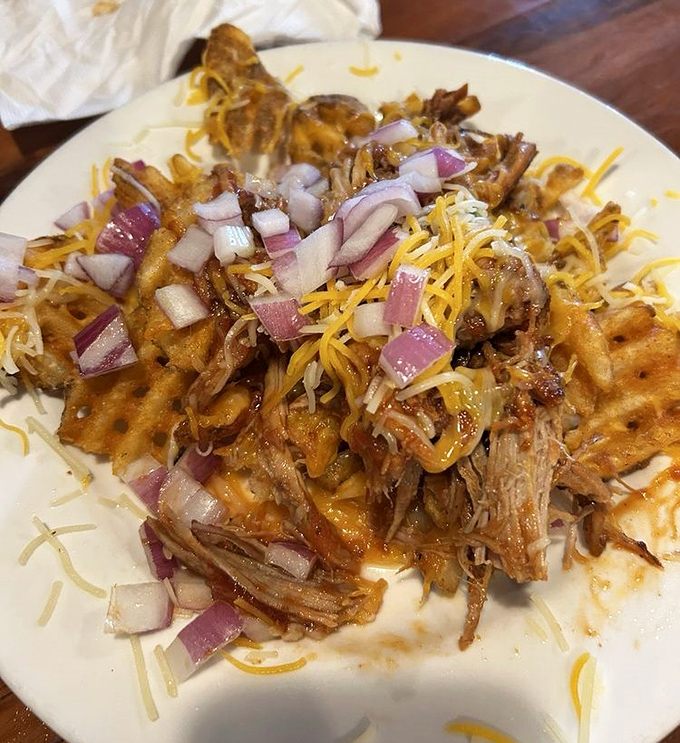 Pulled pork atop a crispy waffle creates a sweet-savory masterpiece that proves barbecue innovation is alive in Wisconsin.