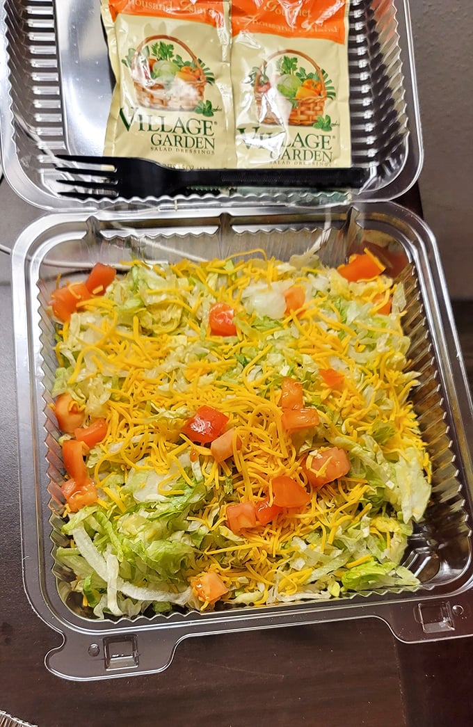 A fresh garden salad provides the perfect counterpoint to pizza indulgence &ndash; crisp, colorful, and surprisingly satisfying.