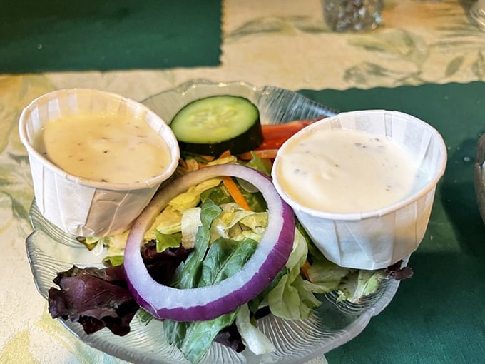 Fresh salad provides the perfect prelude – crisp vegetables and house-made dressing setting the stage for what's to come.