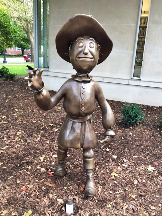 The Scarecrow stands with his characteristic pose, seemingly ready to break into dance or dispense wisdom despite his straw-filled head.