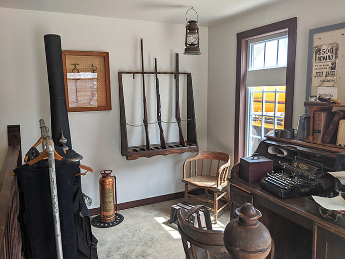 The Sheriff's Office and Fire Hall interior displays vintage equipment that protected communities when "calling 911" meant running down the street yelling.