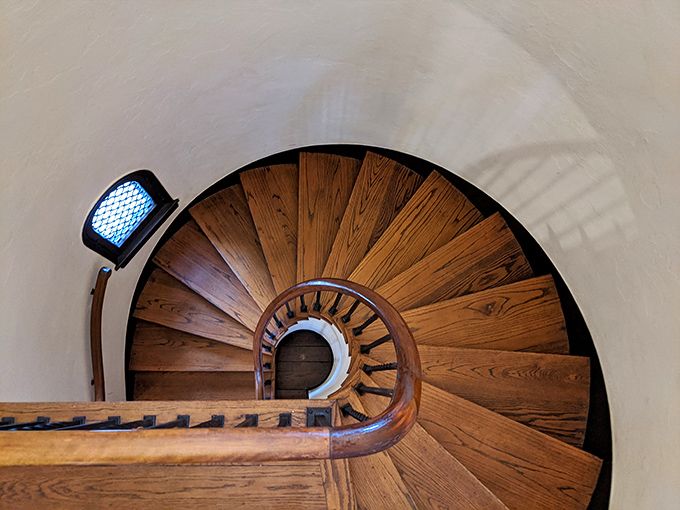 That spiral staircase deserves its own dramatic entrance music, curving upward in the tower like something from a Gothic romance novel set in Spain.