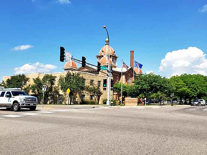 The historic courthouse stands sentinel over downtown, its distinctive dome a landmark visible throughout this charming river community.