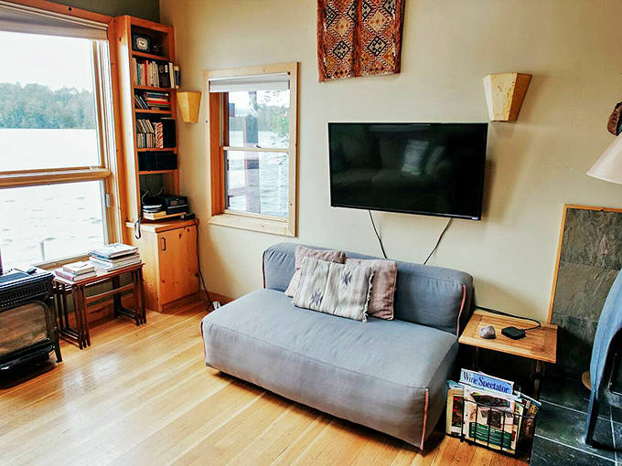 Entertainment redefined: a simple television competes with nature's own spectacular show just outside those generous windows.