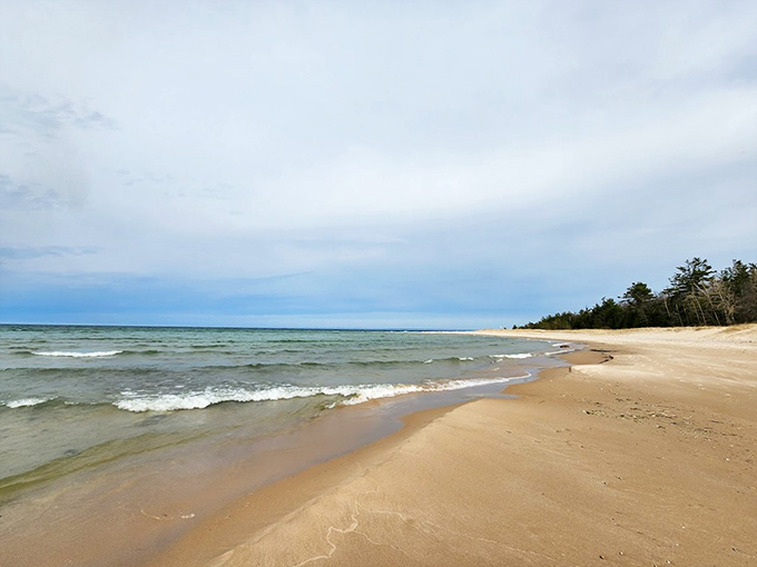Wide sandy beaches stretch toward the horizon, offering plenty of space for everyone to find their own slice of Great Lakes paradise.