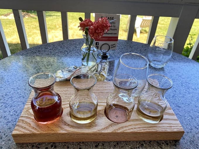 A flight of discovery awaits &ndash; four distinctive wines presented on a handcrafted wooden board, ready to introduce palates to Michigan's cool-climate wine excellence.