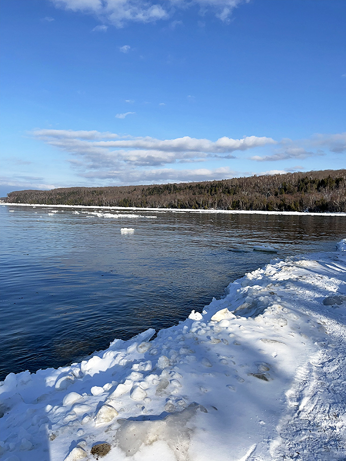 Winter transforms the beach into a frozen wonderland that looks like Elsa from Frozen decided to vacation in Michigan's Upper Peninsula.