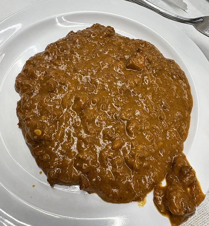 The legendary chili &ndash; heart of the Lafayette experience &ndash; simmered to savory perfection with a secret recipe guarded more carefully than Fort Knox.