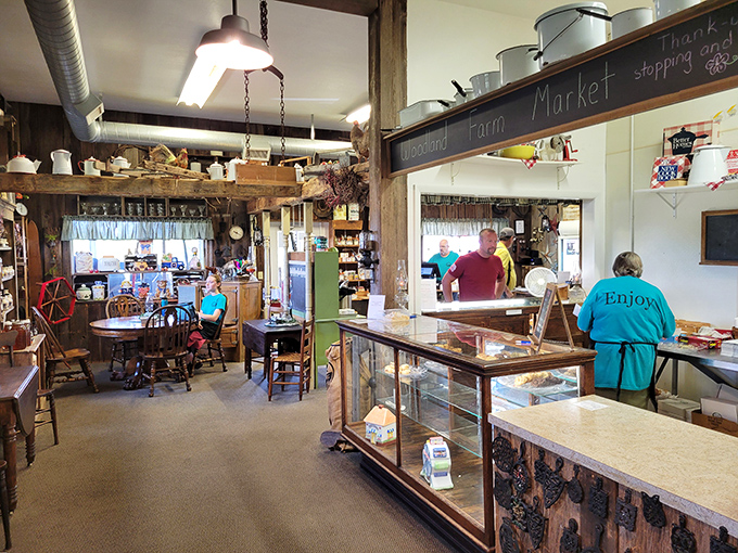 The heart of Woodland Farm Market, where transactions become conversations and strangers leave as friends with full shopping bags.