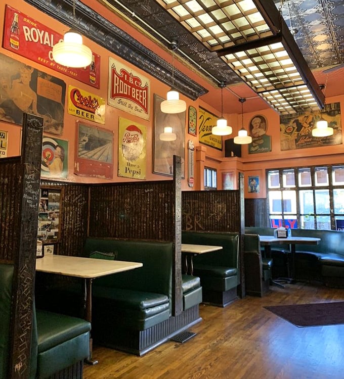 The dining area feels like eating in your coolest grandparent's basement &ndash; vintage advertisements, comfortable booths, and decades of Michigan memories on display.