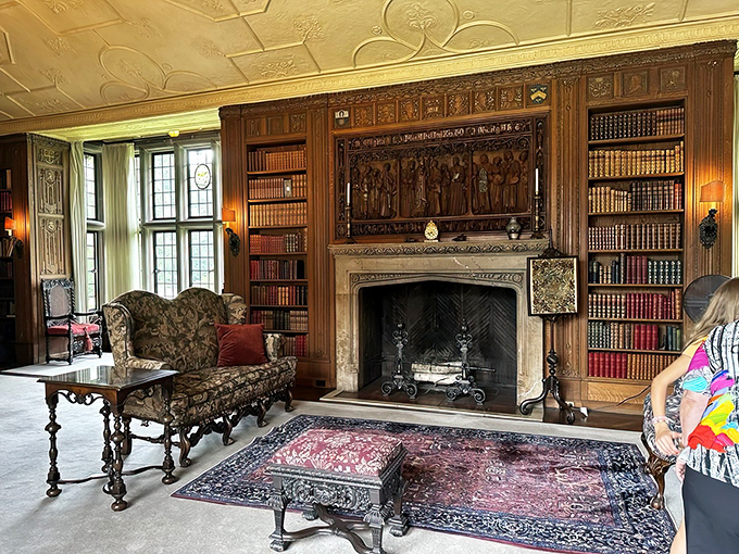 This isn't just a fireplace &ndash; it's practically a room within a room, where craftsmanship and comfort create the perfect spot for literary escapes.