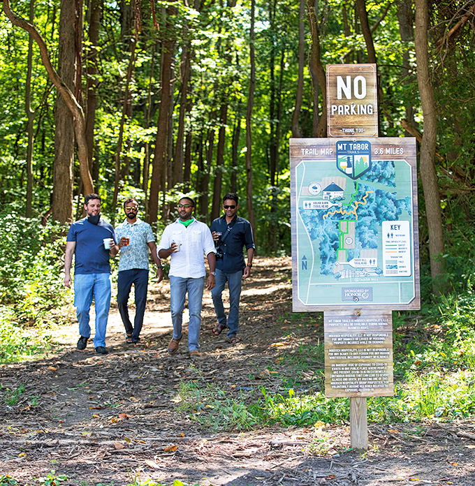 Friends make the perfect hiking companions on Mt. Tabor Trails, where conversations flow as easily as the wines waiting at trail's end.