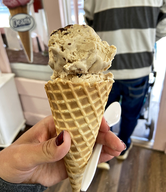 The ultimate Mackinac Island accessory isn't a souvenir t-shirt – it's this waffle cone filled with fudge-infused ice cream bliss.