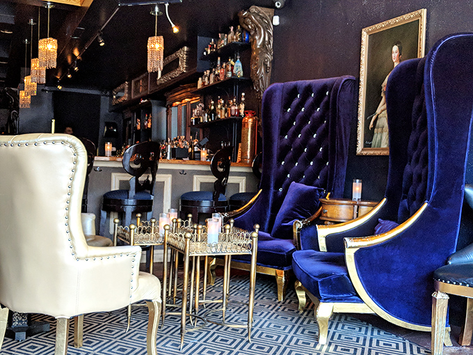 The long, narrow space creates an intimate tunnel of sophistication where every seat feels like the best in the house.