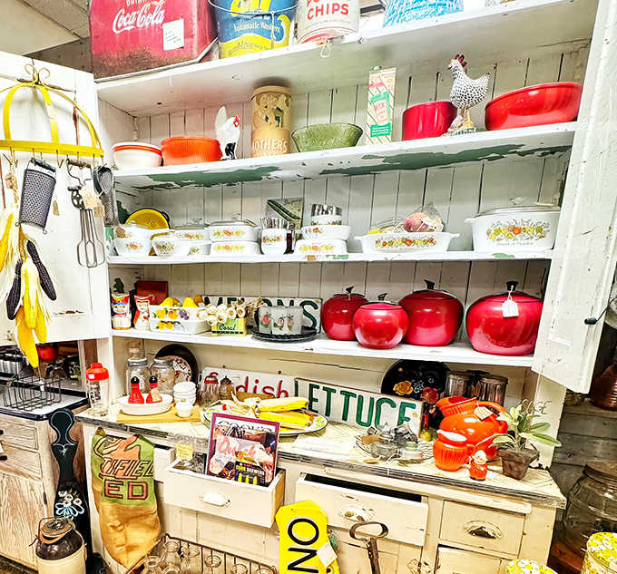 Colorful vintage kitchenware and apple-shaped canisters prove that functional items can be delightfully decorative at the same time.