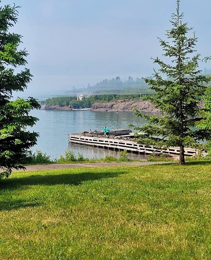 Fishing dock dreams: Morning mist creates a dreamy atmosphere at this quiet harbor, where local anglers connect with Lake Superior's bounty.