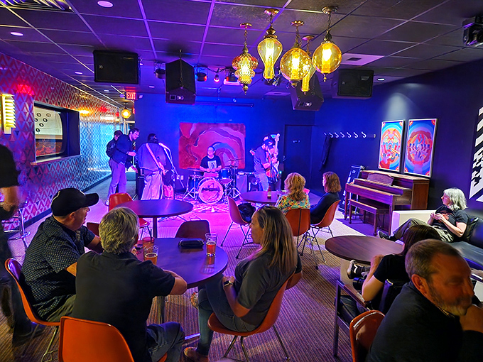 Live music transforms the lounge into an intimate concert venue where local talent provides the soundtrack for strikes and spares.