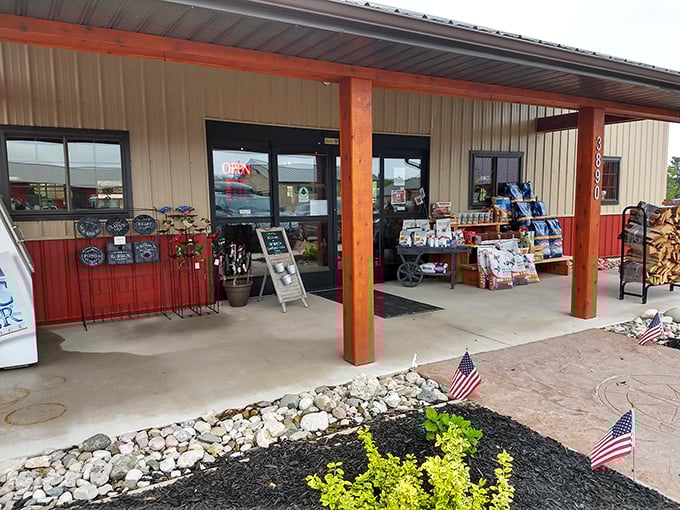 The market entrance beckons with its warm wooden beams and promise of local treasures. Those American flags aren't just for decoration.