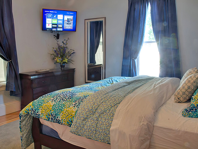 The master bedroom offers a serene retreat with splashes of color that would make any interior designer from the '50s proud.