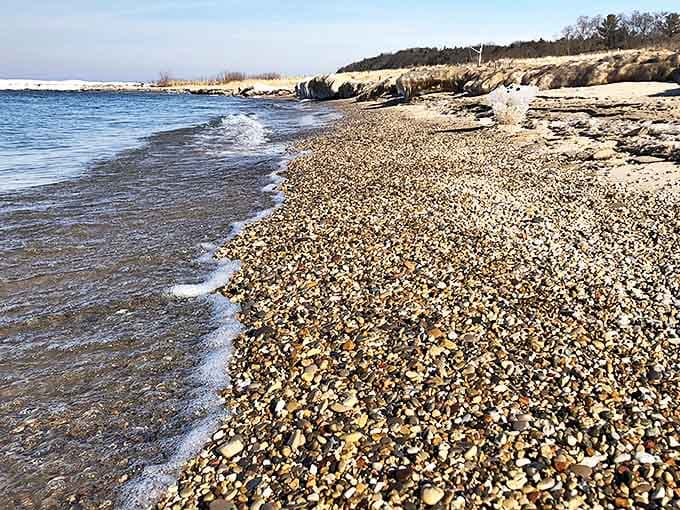 Nature's mosaic &ndash; pebbles and stones create a natural artwork along the shoreline, each piece with its own geological story.
