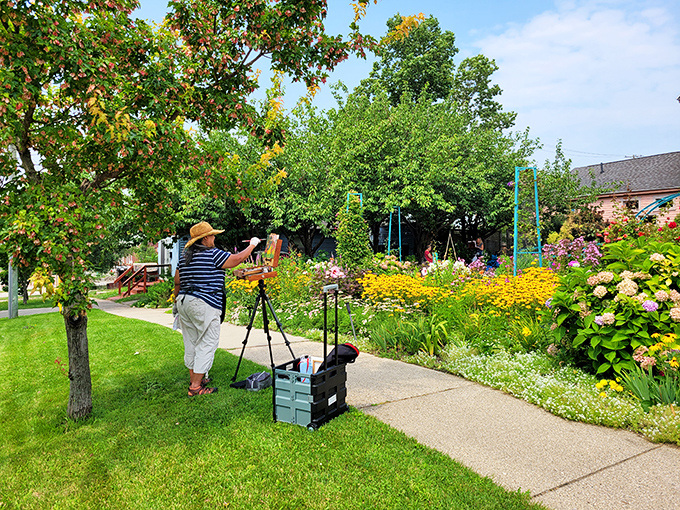 Art imitates life imitates art – a painter captures the garden that captures Monet's vision in a delightful creative loop.