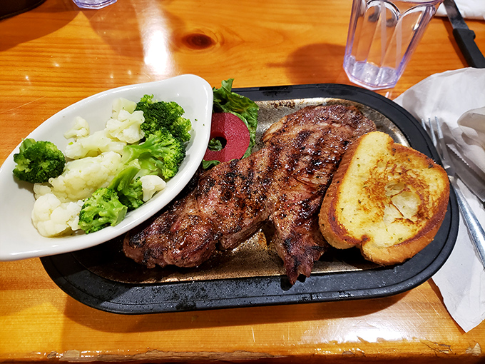 A steak that makes you wonder why you ever ordered anything else &ndash; accompanied by vegetables for moral support.