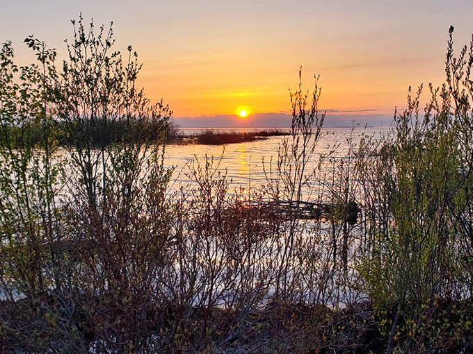 The sun bids goodnight to Michigan in a spectacular display that makes even the most jaded travelers pause in awe.