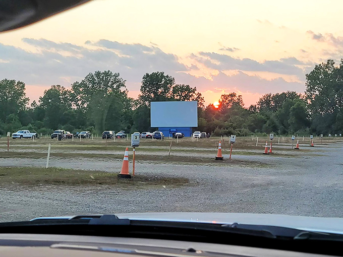 Nature provides the perfect backdrop as the sun bids farewell, setting the stage for celluloid dreams to illuminate the darkness.