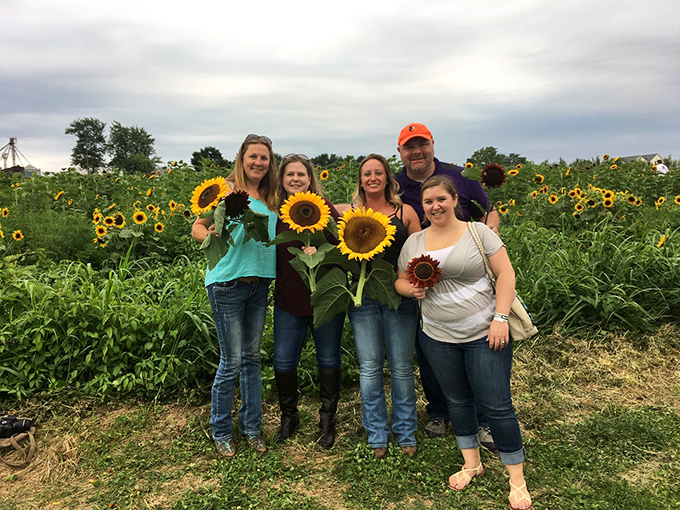 Squad goals achieved! Nothing bonds friends like a day spent wandering through nature's most cheerful creation, cameras and laughter in abundance.