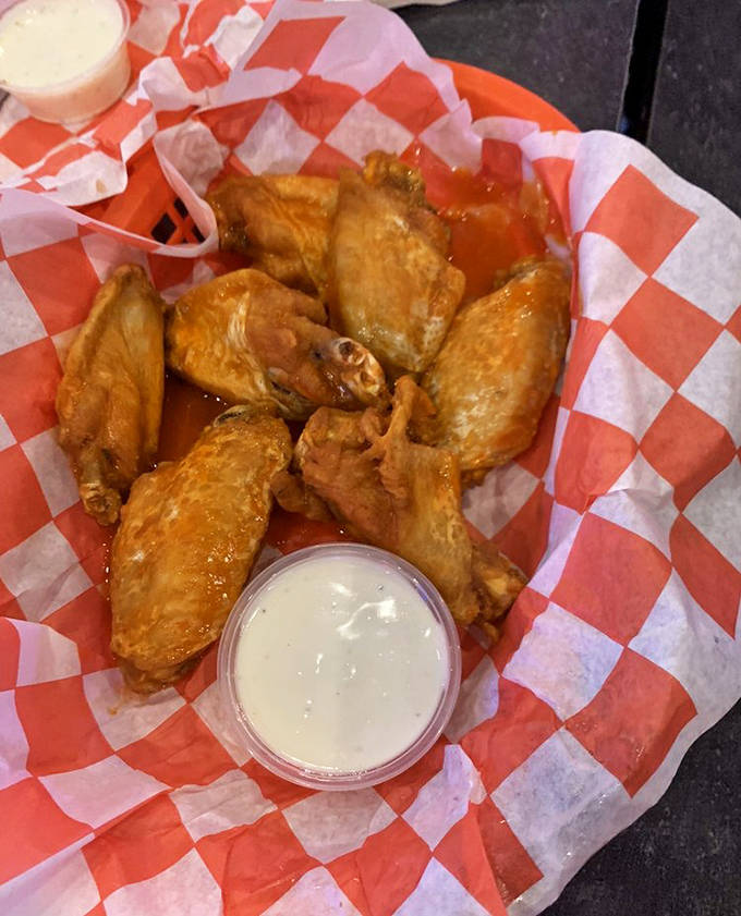 Wings so good they'll make you believe in flying saucers &ndash; crispy, juicy, and tossed in sauces ranging from mild to "might actually be alien biochemical compounds."