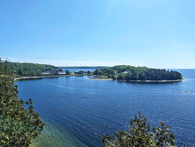 Sapphire waters stretch to the horizon, cradling the historic townsite in a blue embrace that would make Caribbean beaches jealous.