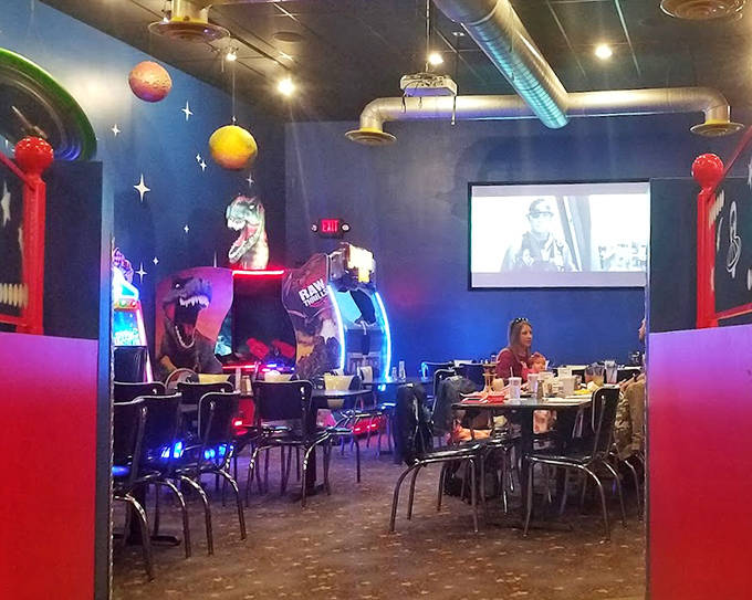 The arcade area buzzes with cosmic energy &ndash; a symphony of beeps and boops where kids (and kids at heart) can play between bites.