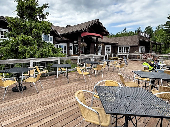 The outdoor deck offers al fresco dining with a side of pine-scented breezes—nature's perfect complement to comfort food.