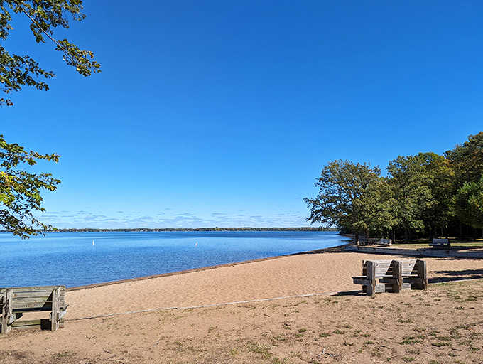 Golden sands stretch toward the horizon at Father Hennepin State Park, where Minnesota somehow forgot it's supposed to be landlocked.