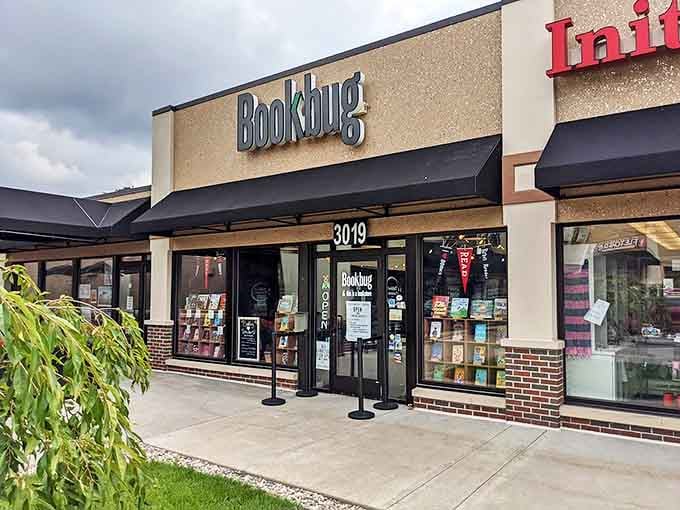 The unassuming storefront with its straightforward "Bookbug" sign promises literary treasures within &ndash; like finding a secret garden behind an ordinary door.