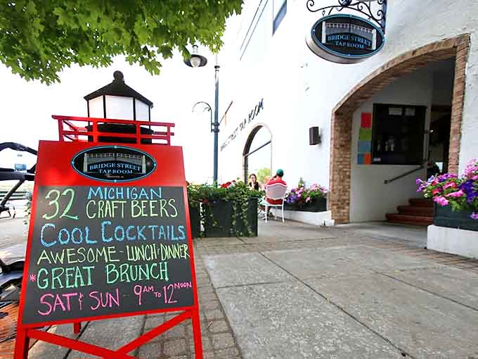 The welcoming exterior of Bridge Street Tap Room beckons with its cheerful red sign and promise of 32 Michigan craft beers &ndash; an invitation no beer lover could refuse.