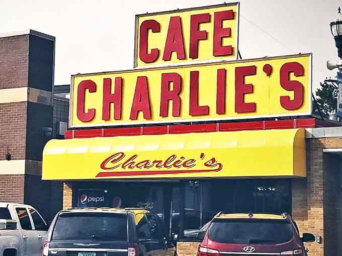 The iconic yellow and red signage of Charlie's Cafe stands out in Freeport like a beacon of comfort food promise.