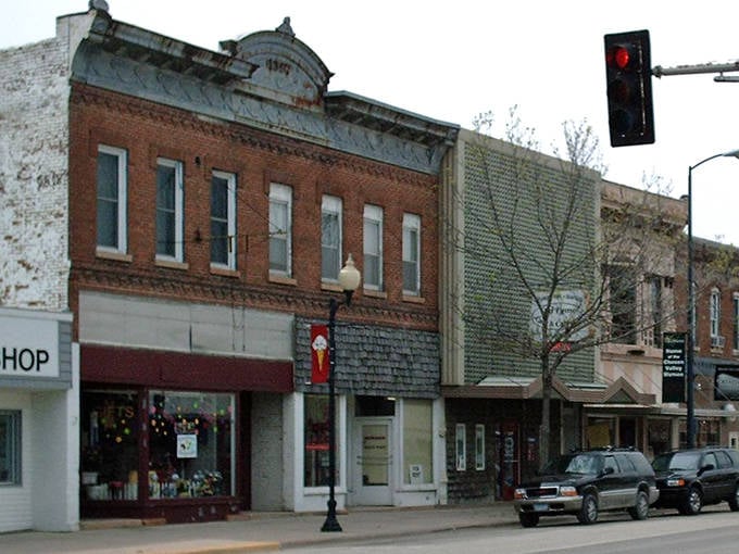 Historic brick buildings stand sentinel along Main Street, whispering stories of bygone eras while welcoming modern visitors with timeless charm.