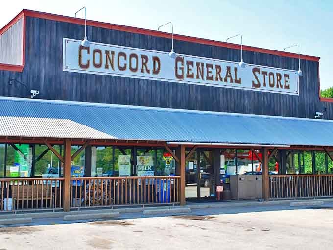 The Concord General Store stands proudly with its weathered charm, a humble facade hiding the animal wonders that await behind.