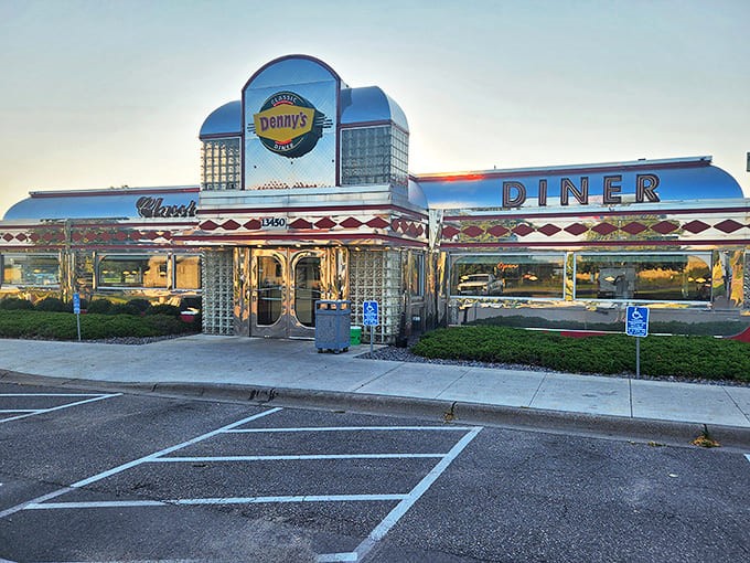 Denny's Classic Diner gleams like a chrome jewel in Rogers, Minnesota, its retro silhouette promising comfort food and nostalgia in equal measure.