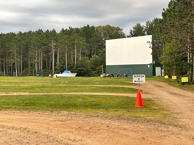 The iconic Stardust screen stands tall among Wisconsin pines, waiting for dusk to transform into cinema magic.